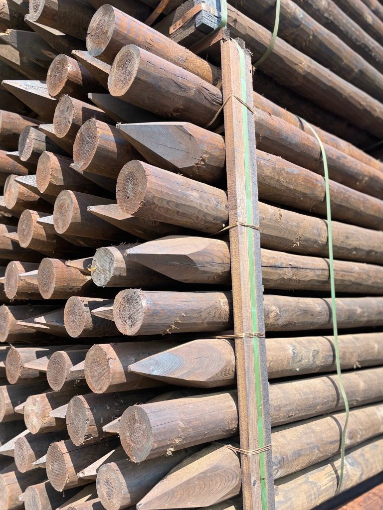 75mm - 100mm Cundy Peeled Posts - Creosote | Coltman Bros Timber Merchants